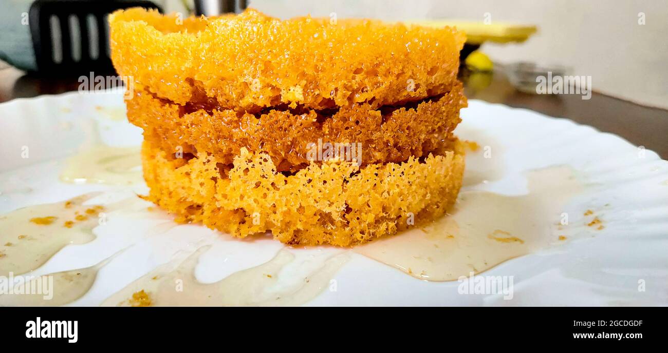 Popular and traditional Indian Rajasthani sweet dessert called Ghevar ...