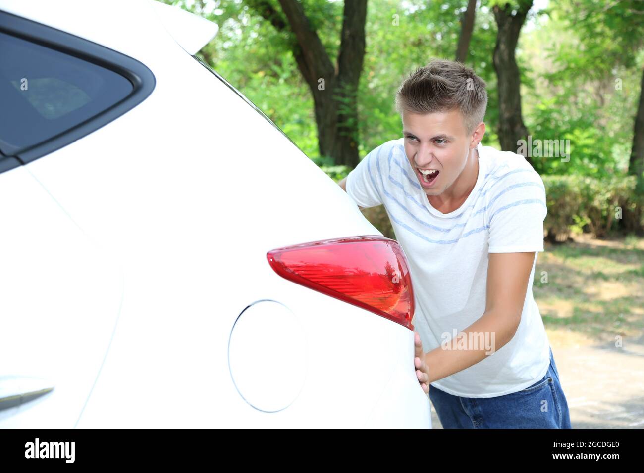 Pushing stalled car hi-res stock photography and images - Alamy