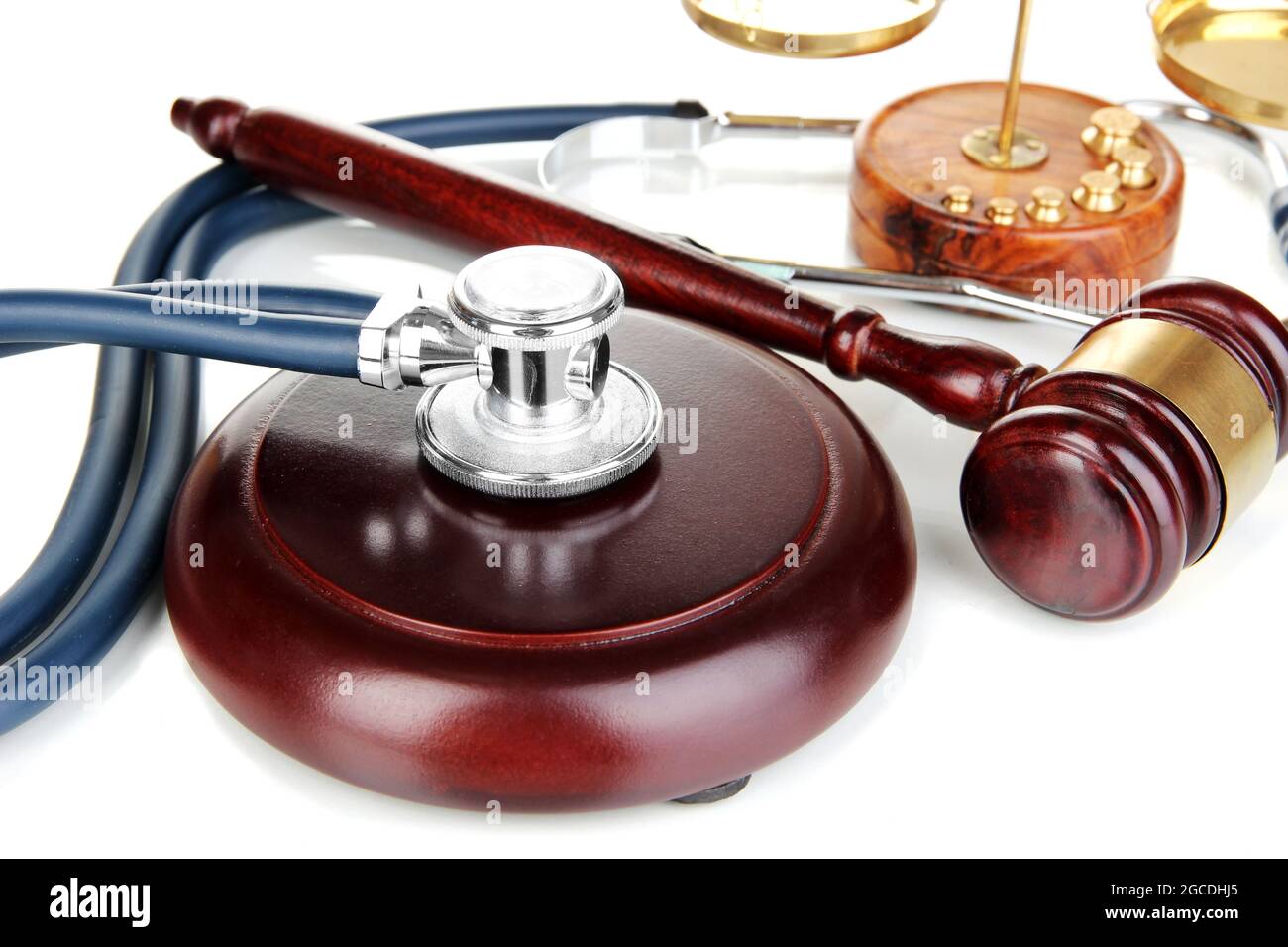 Medicine law concept. Gavel, scales and stethoscope close up Stock ...