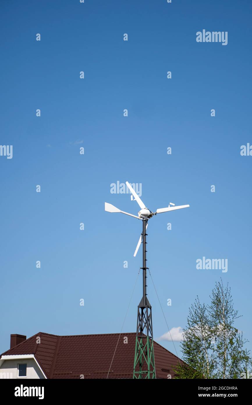 Windmill for renewable electric energy production in a private sector ...
