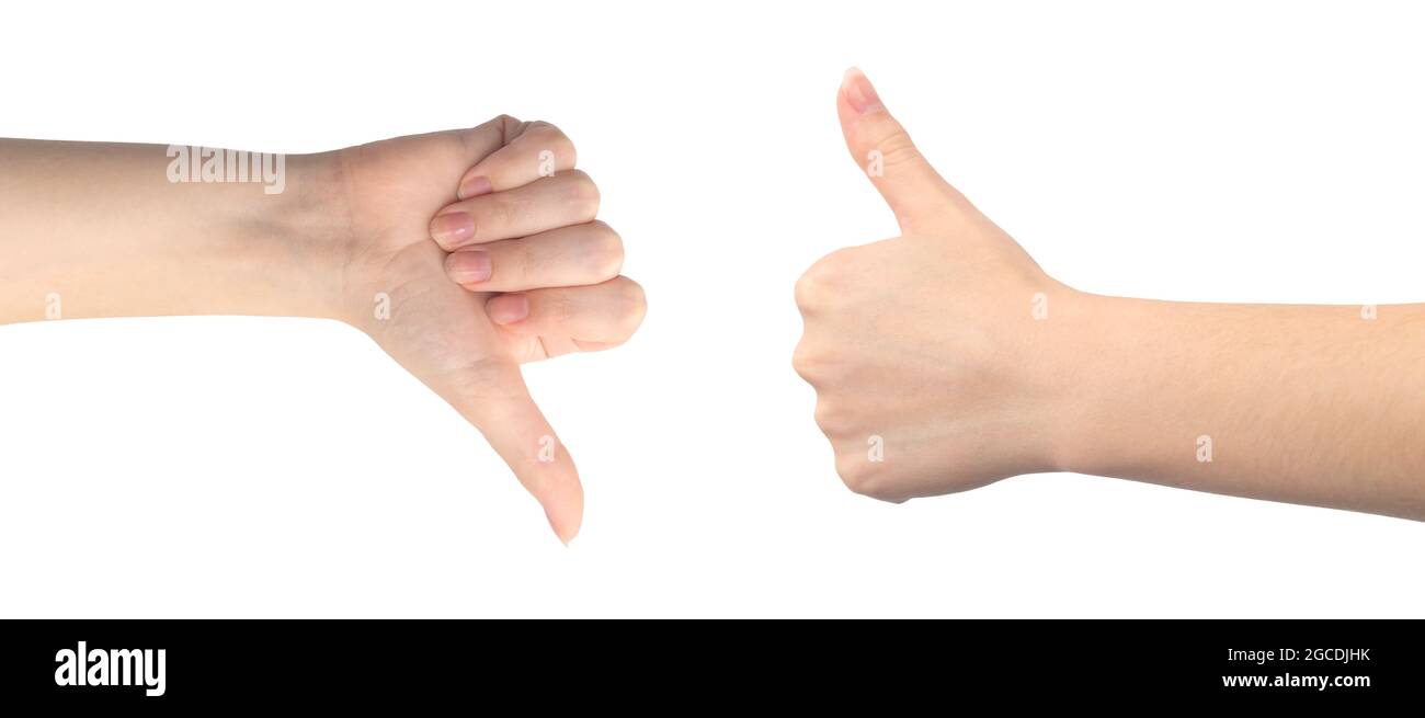 Like and dislike hand gesture, young female hand close-up, isolated on ...
