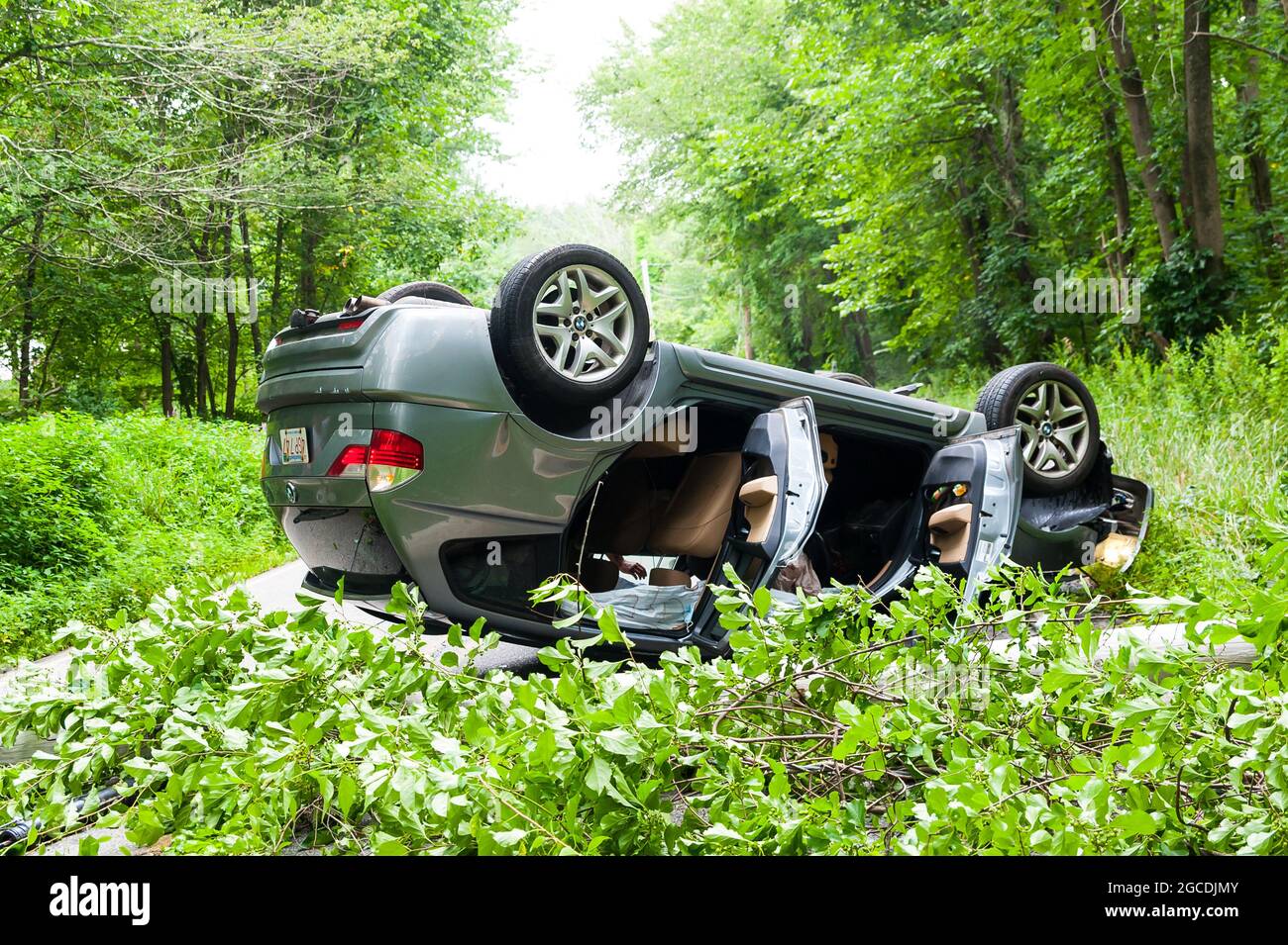 First responders taking care of rollover accident Stock Photo - Alamy