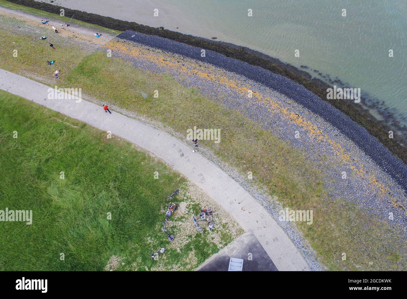 artistic aerial view at the seawall of scheldt river at the dutch coast ...