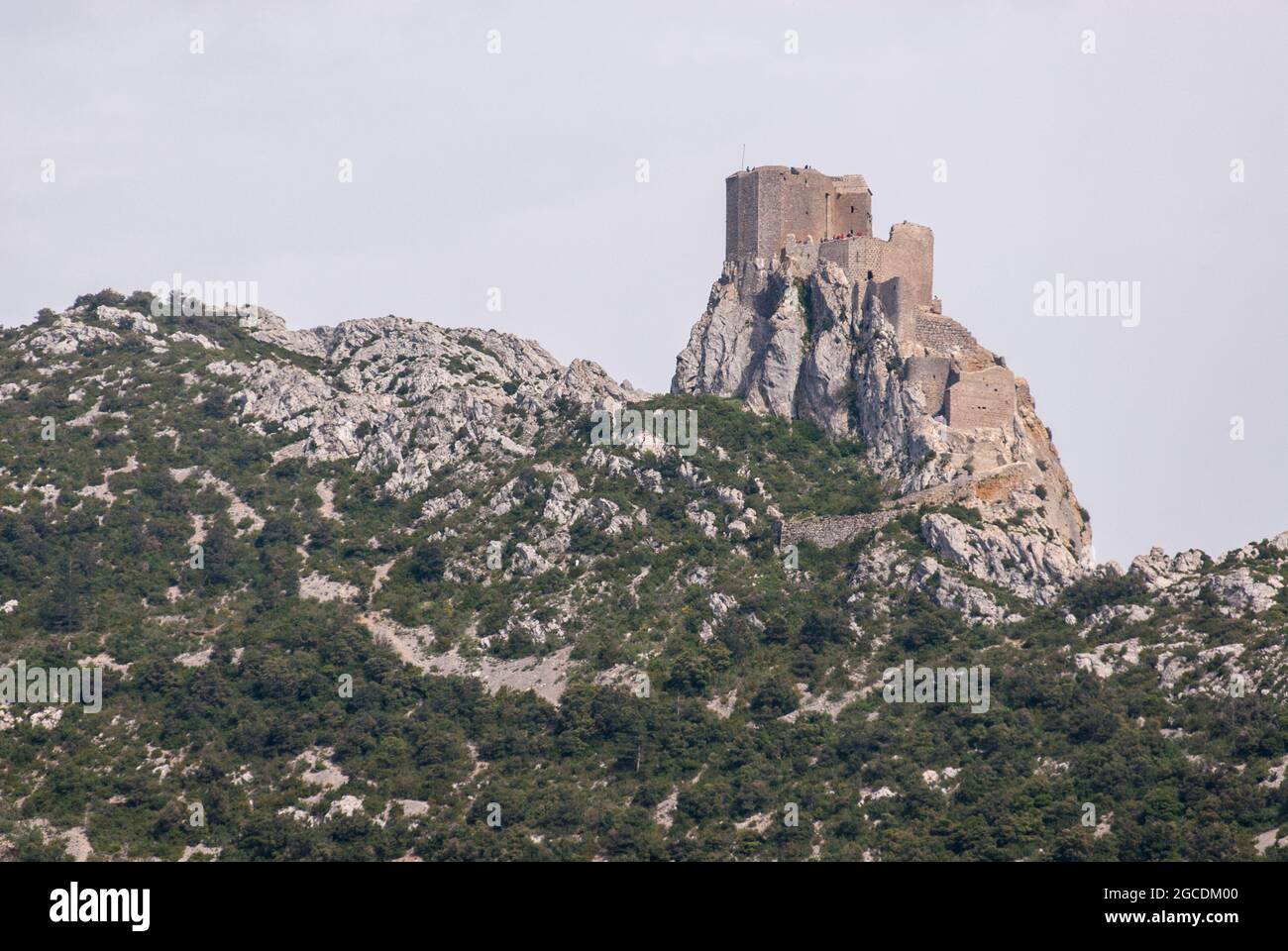 Quéribus castle sits highly visible from afar and well-defended on a ...