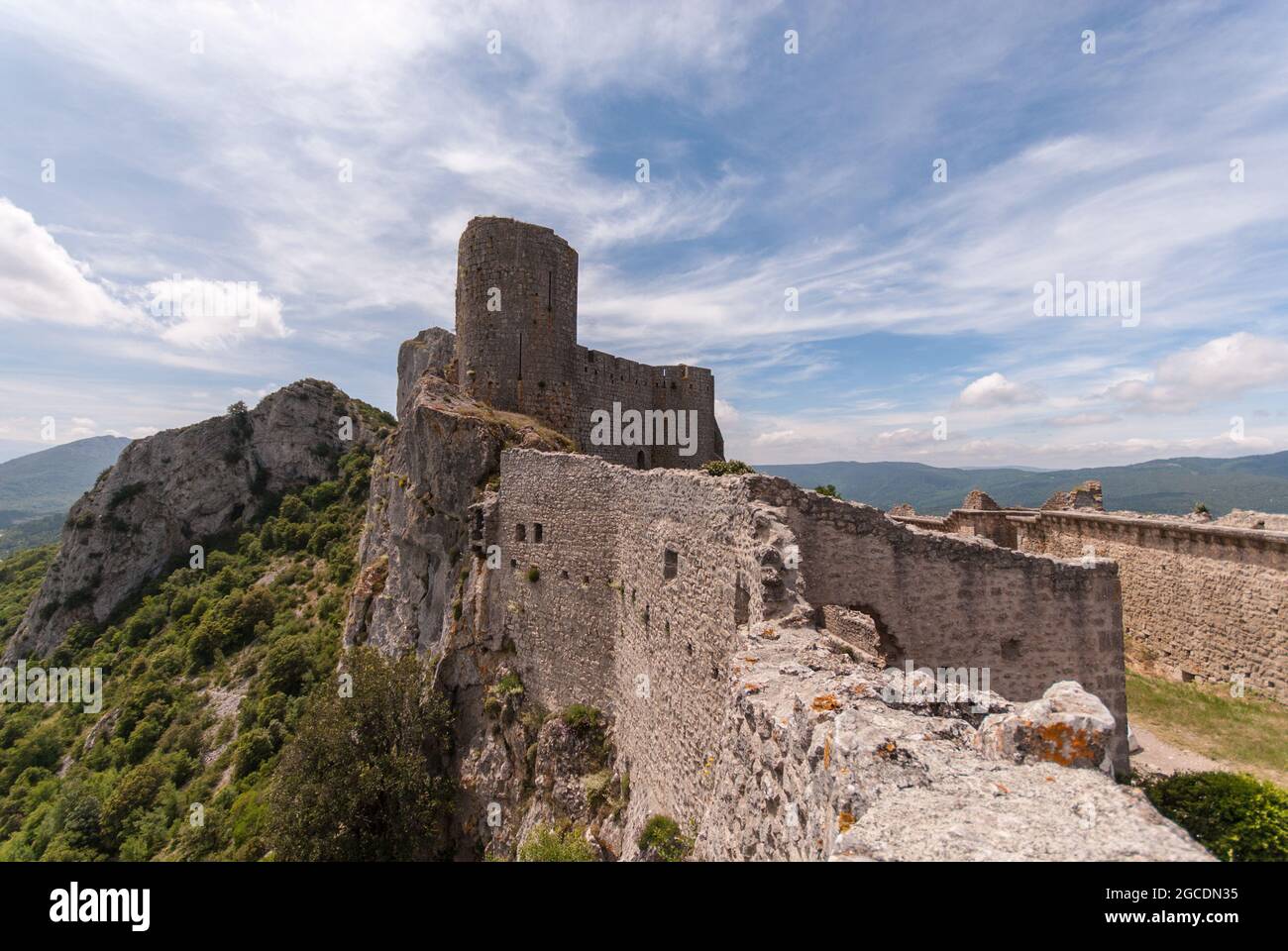Peyrepertuse castle sits in a strategic and dominating position on a ...