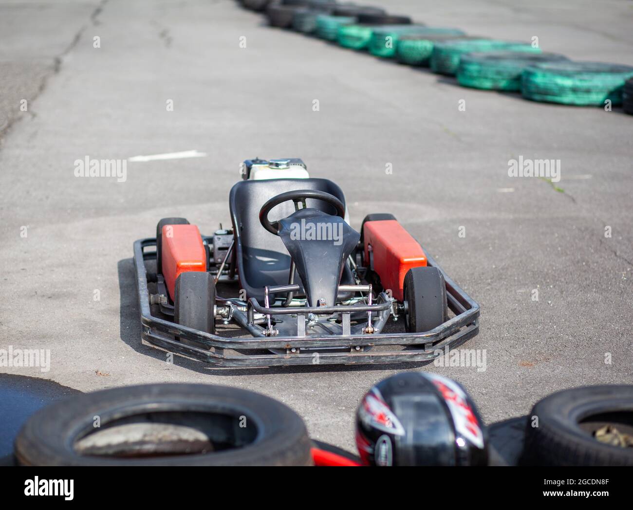 A go-karting car is standing on the highway and waiting for the driver ...