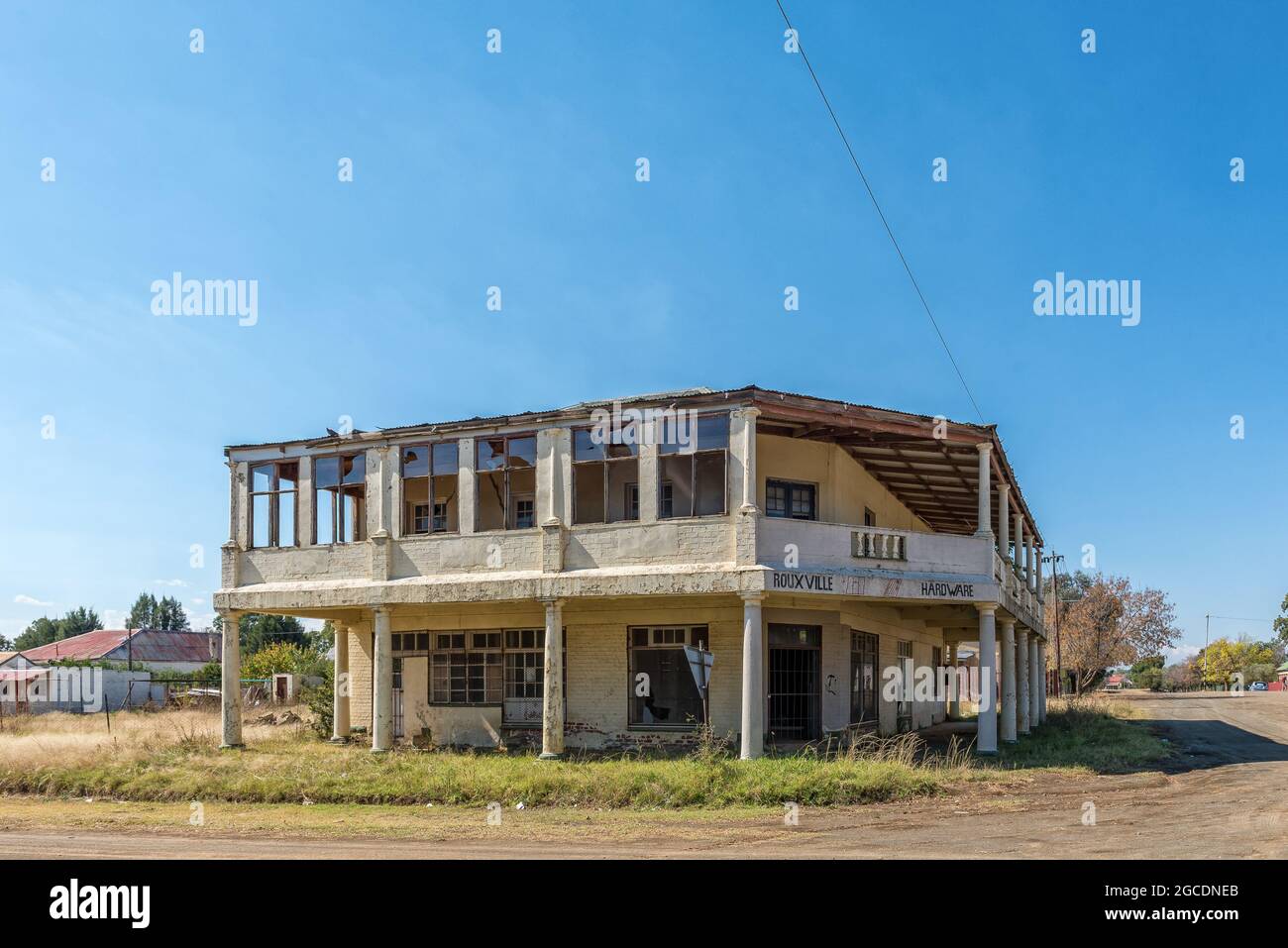 ROUXVILLE, SOUTH AFRICA - APRIL 23, 2021: A street scene, with the ruin ...