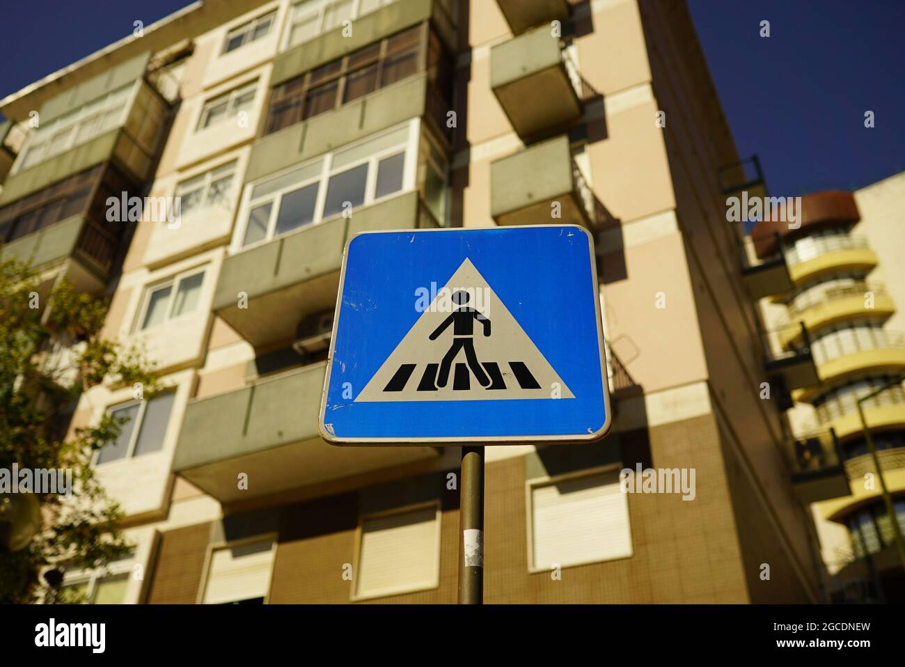 A pedestrian crossing road sign in the urban residential area Stock ...