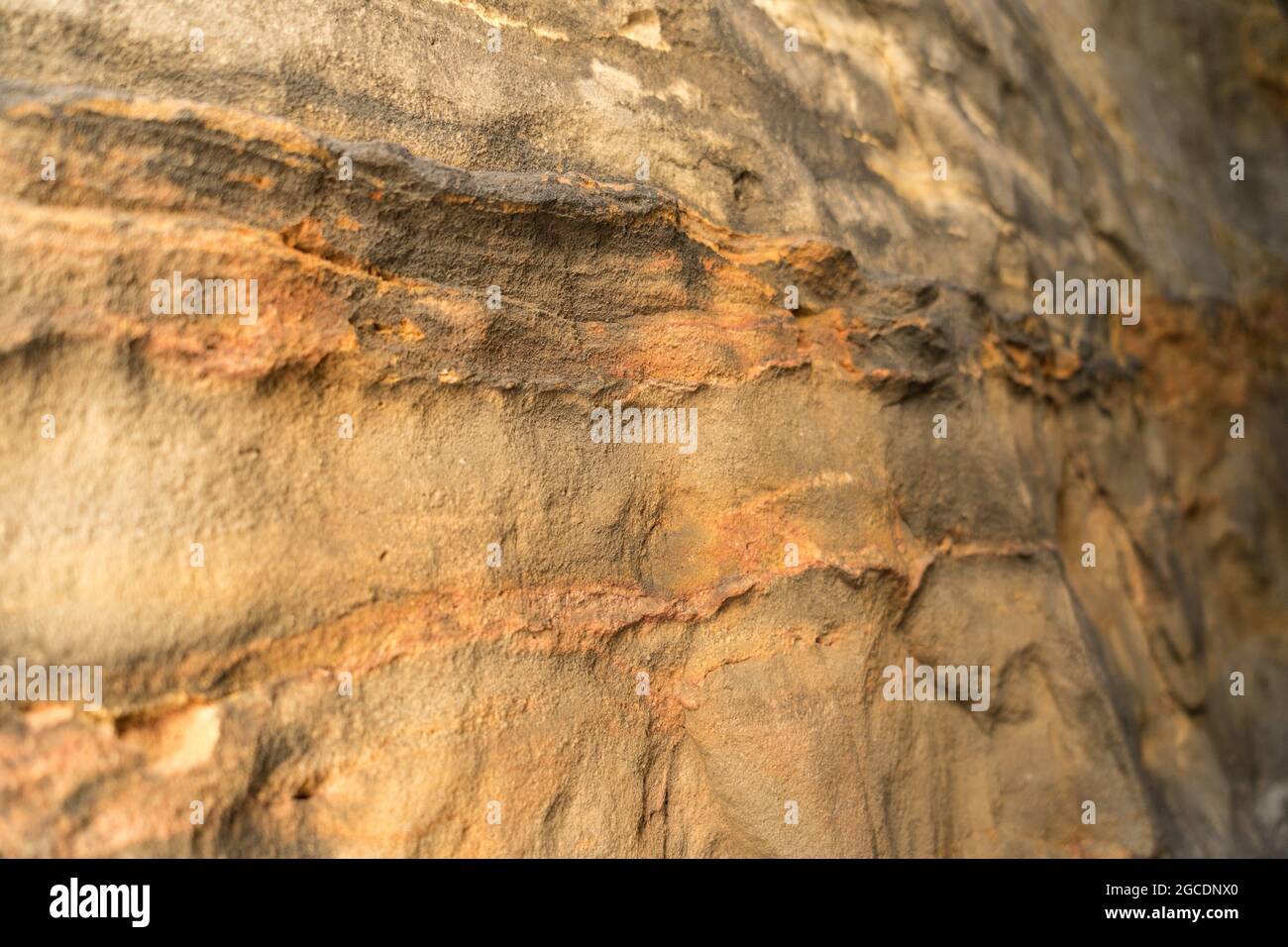 natural orange colored texture of sandstone rocks in the mountains ...