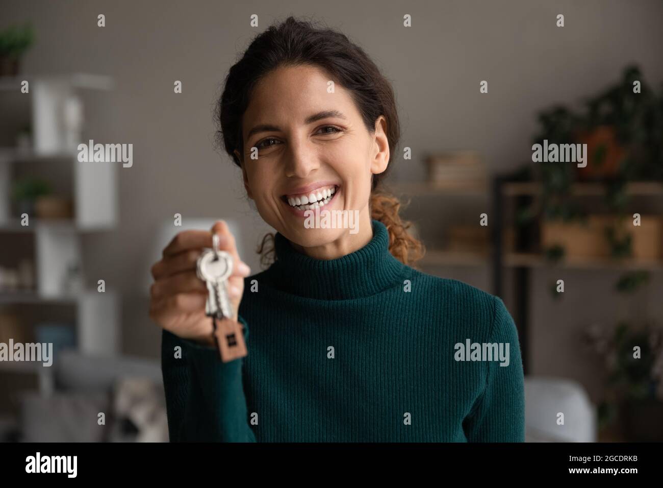 Happy girl keys hi-res stock photography and images - Alamy