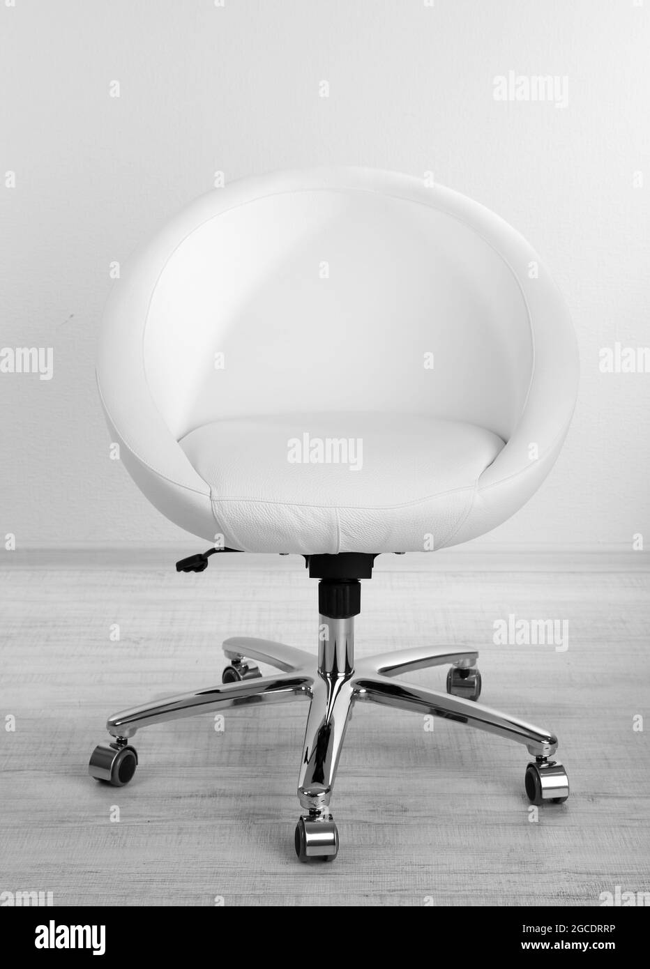 White chair in office Stock Photo - Alamy