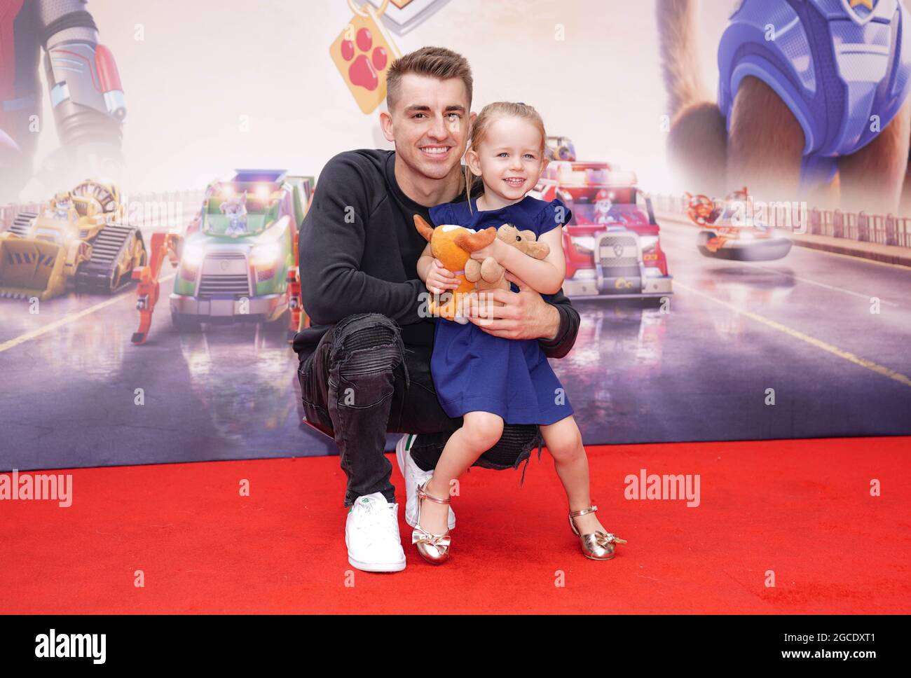 Max Whitlock and daughter Willow arriving for the gala screening of Paw ...