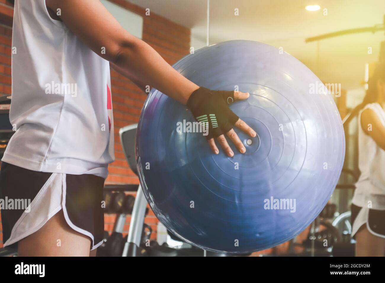 woman working out with gymnastic ball Stock Photo - Alamy