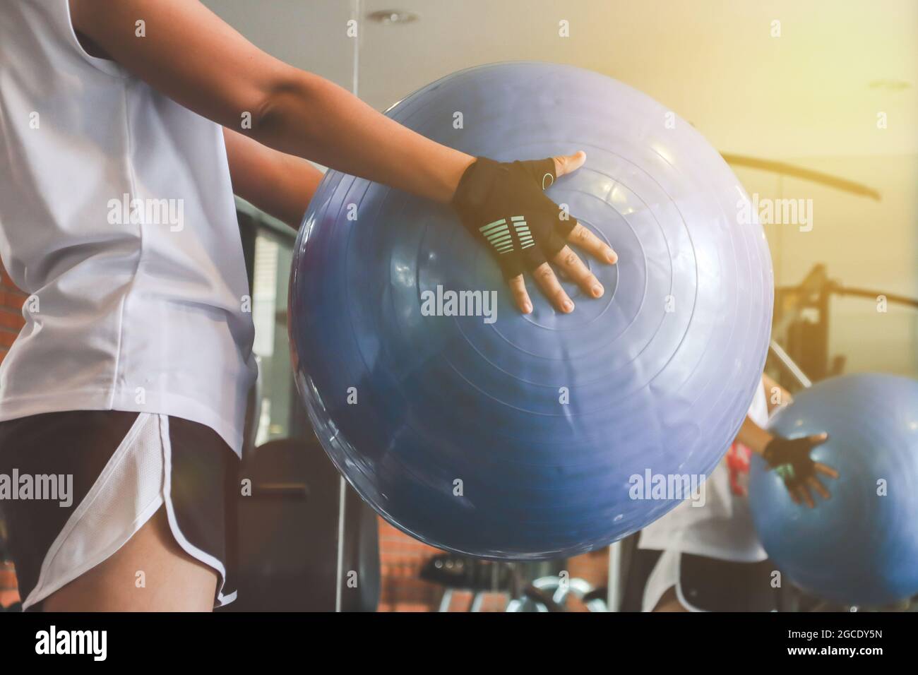 woman working out with gymnastic ball Stock Photo - Alamy
