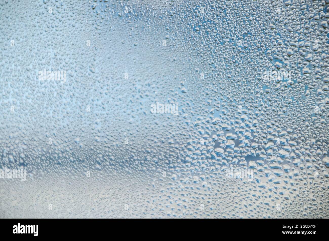 water droplets on glass window see to outside Stock Photo - Alamy