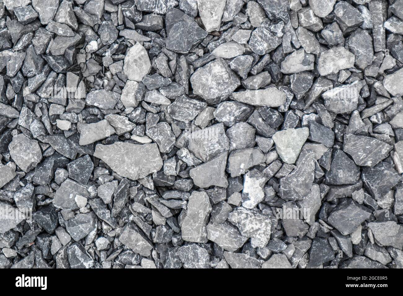 Grey ground stone rubble background of many small stones Stock Photo ...