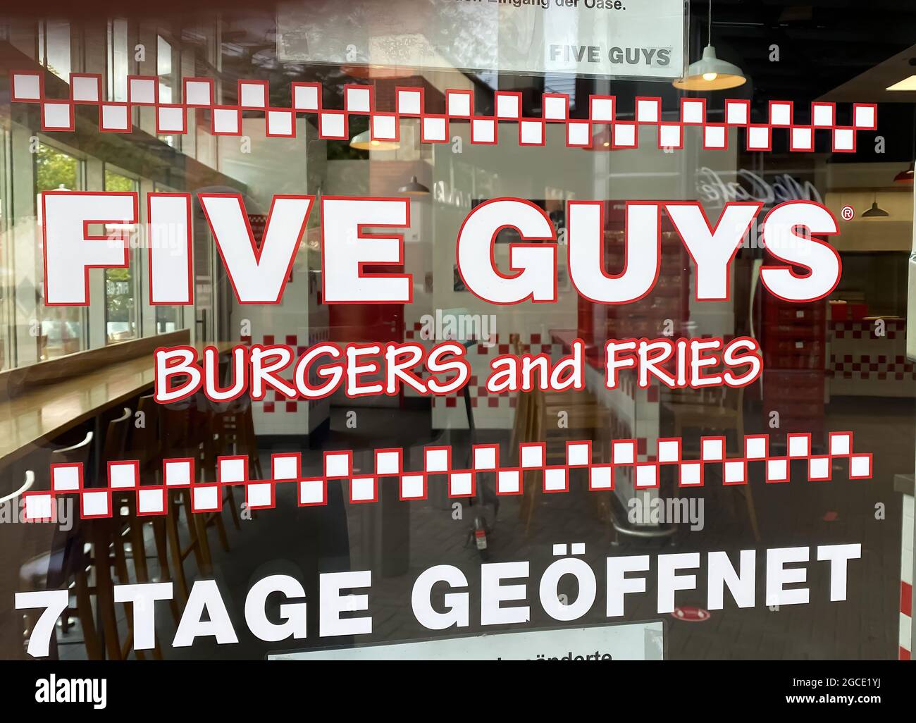 Oberhausen, Germany - August 7. 2021: View on restaurant window with ...