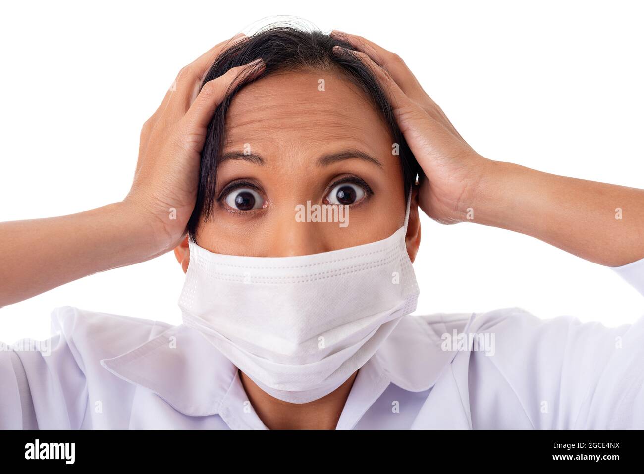 Woman doctor wearing coronavirus surgical face mask in panic scared ...