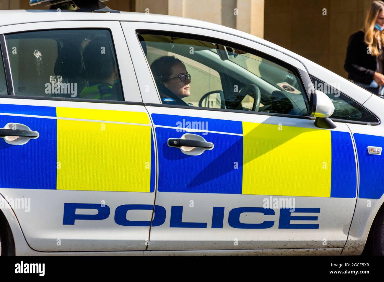Female police officer in police car. Bath, UK, England Stock Photo - Alamy