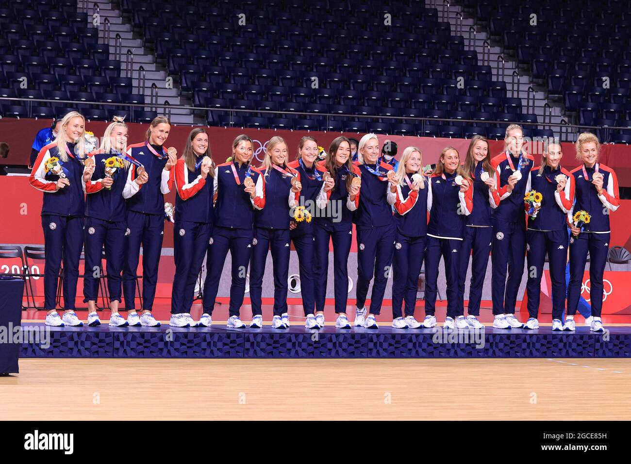 Bronze medalists, Team Norway celebrate on the podium with their medals ...