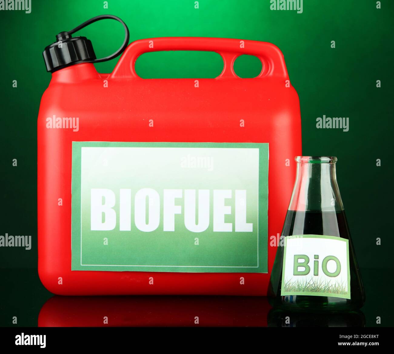 Bio fuels in canister and vial on green background Stock Photo - Alamy