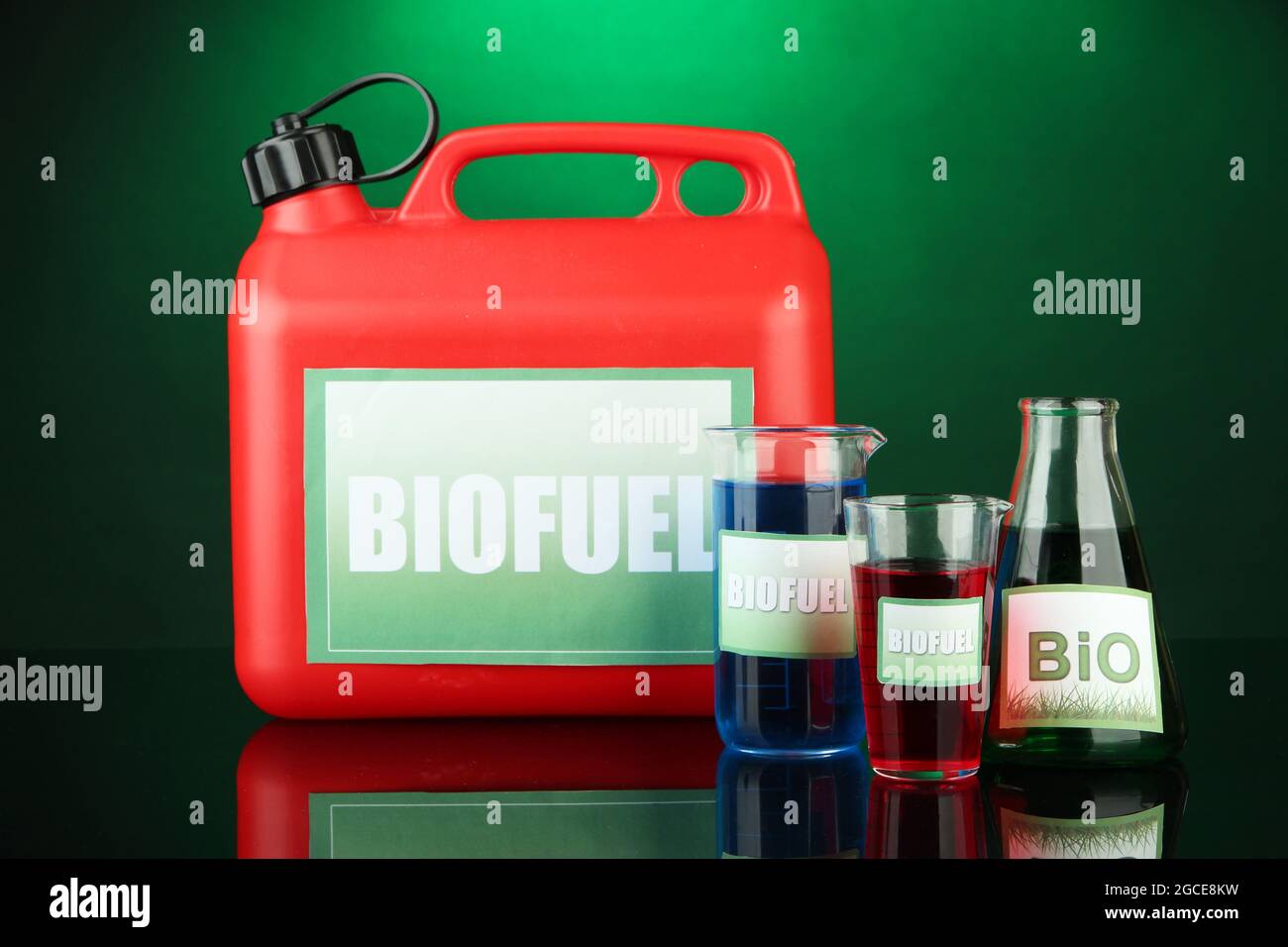 Bio fuels in canister and vials on green background Stock Photo - Alamy