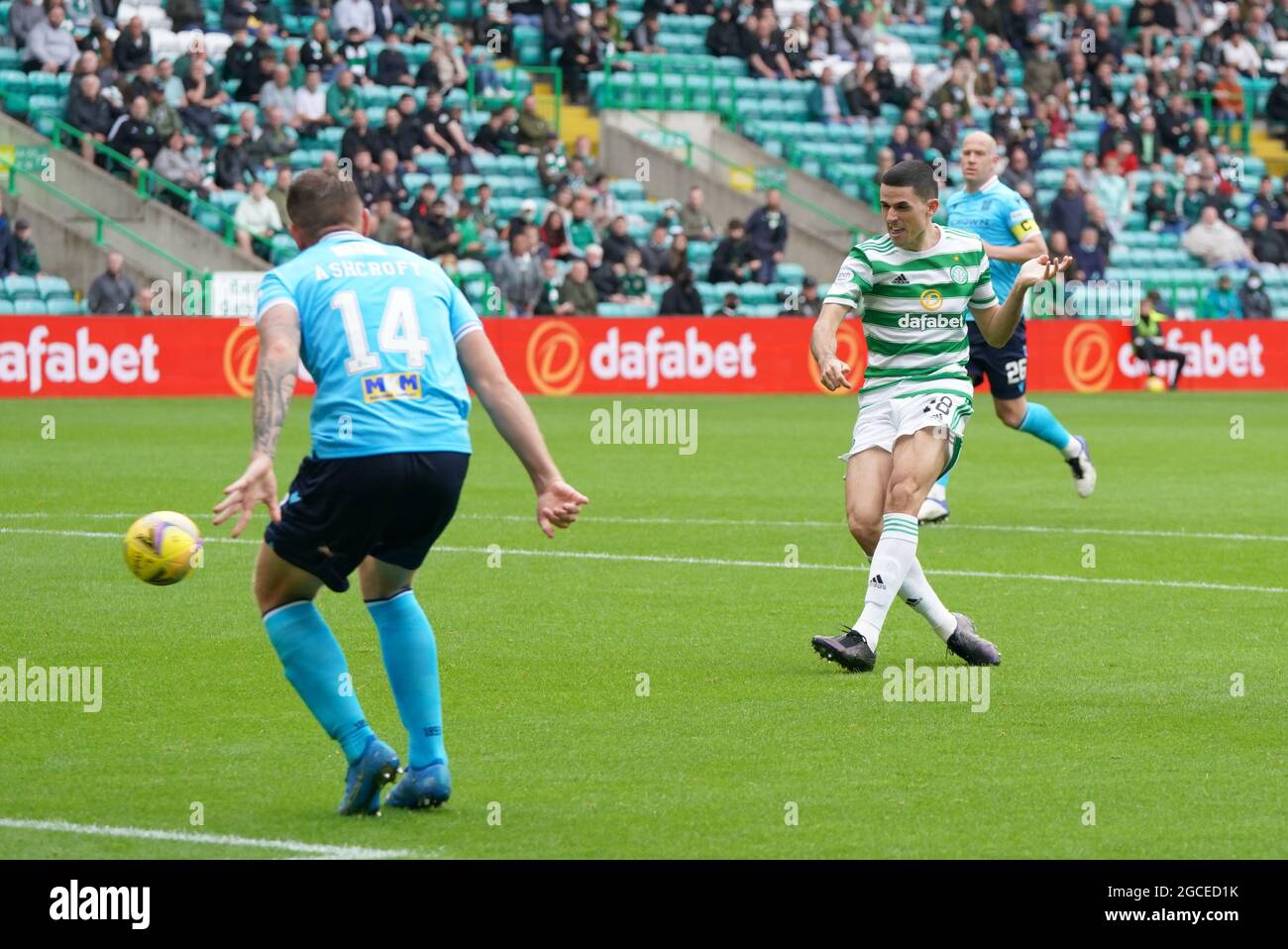 Celtic's Tomas Rogic (right) scores his side third goal of the game ...