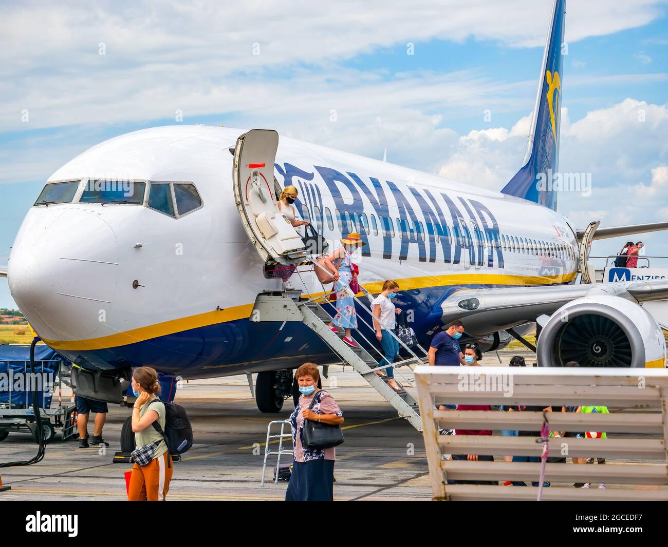 Timisoara, Romania - 06.20.2021: People getting off from a Ryanair ...