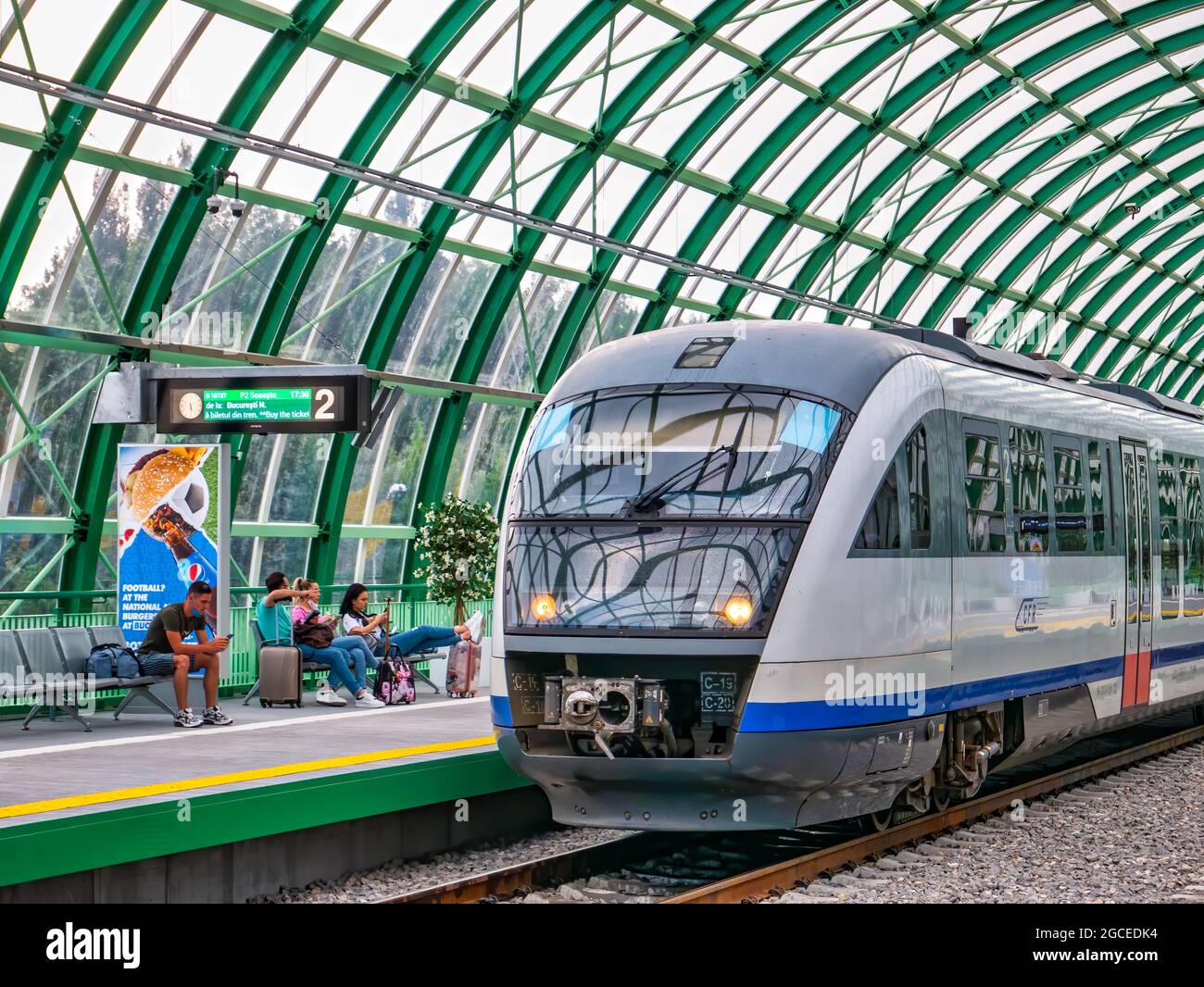 Bucharest, Romania - 06.20.2021: Blue arrow train at Henry Coanda ...