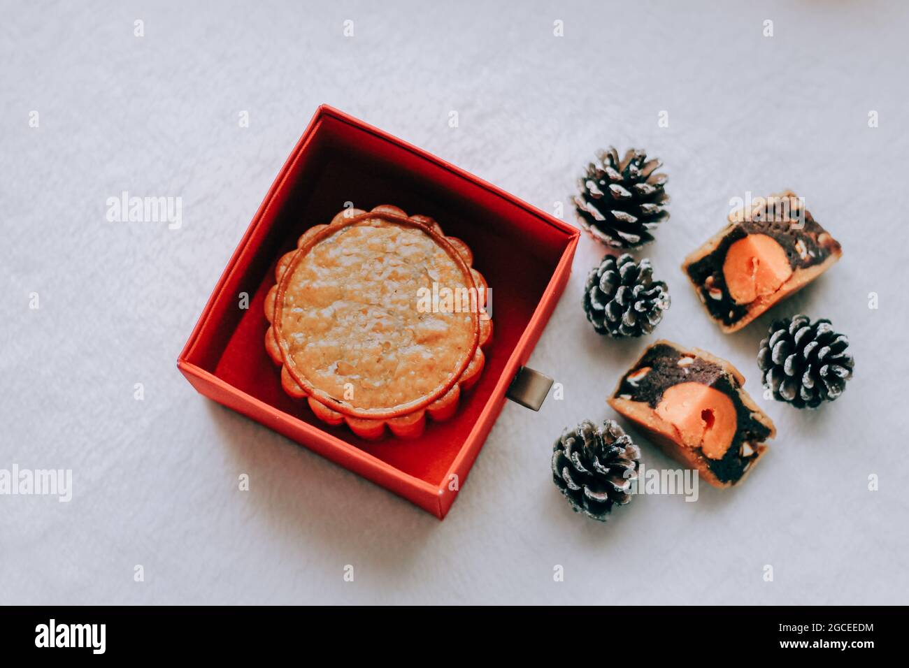Traditional moon cakes in a red box for the Moon Cake Festival or Mid ...