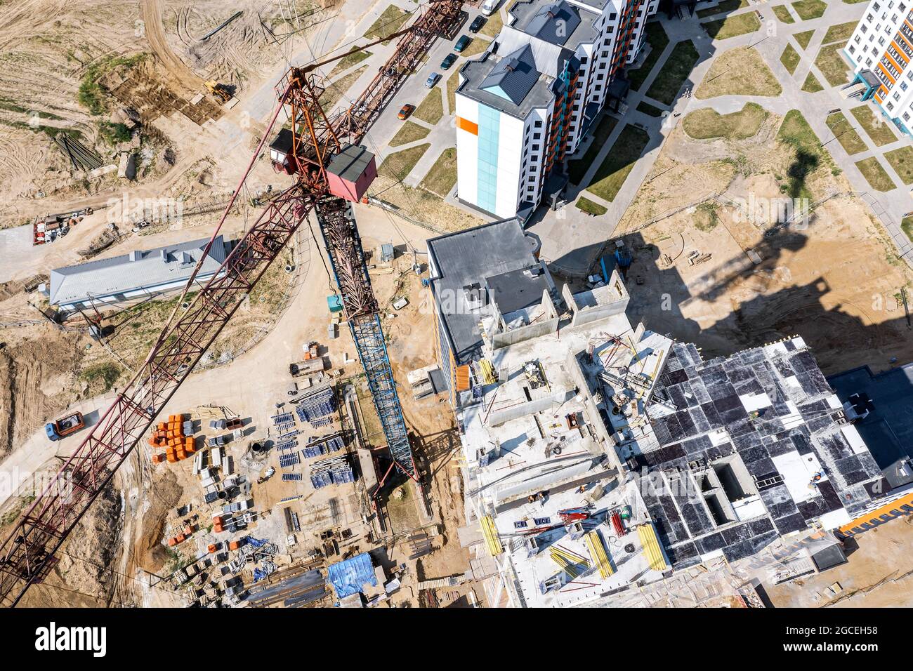 aerial view of construction site with crane and buildings. concept of ...