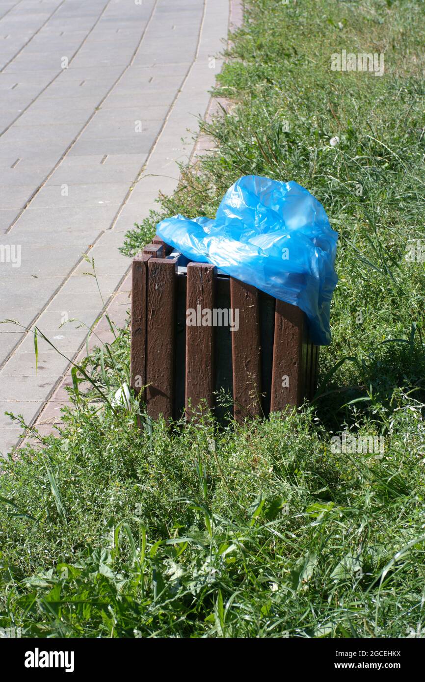 Dustbin in Park at dry sunny summer day Stock Photo - Alamy