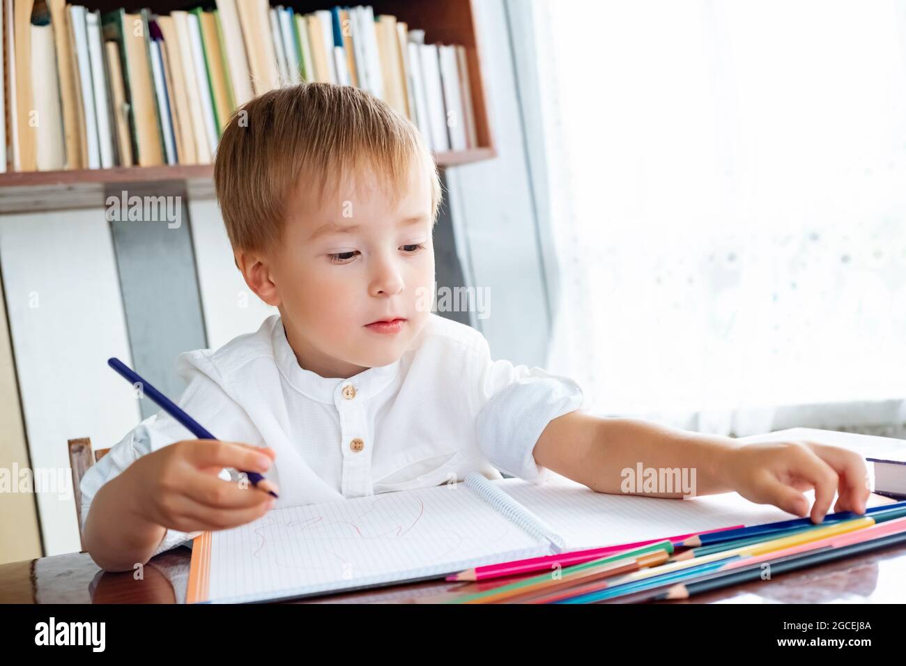 Child drawing table school hi-res stock photography and images - Alamy
