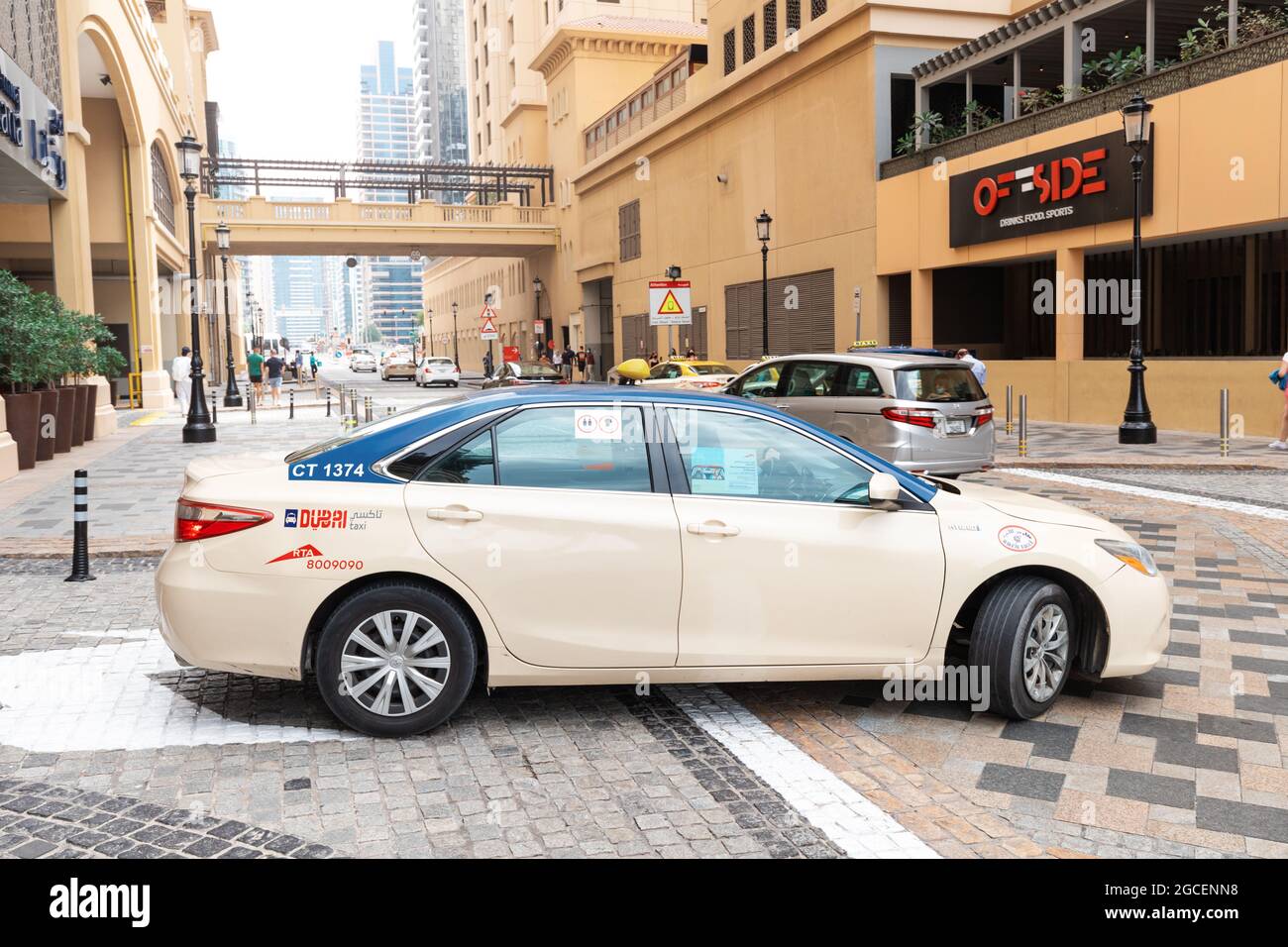 22 February 2021, Dubai, UAE: The famous Dubai beige taxi rides on the ...