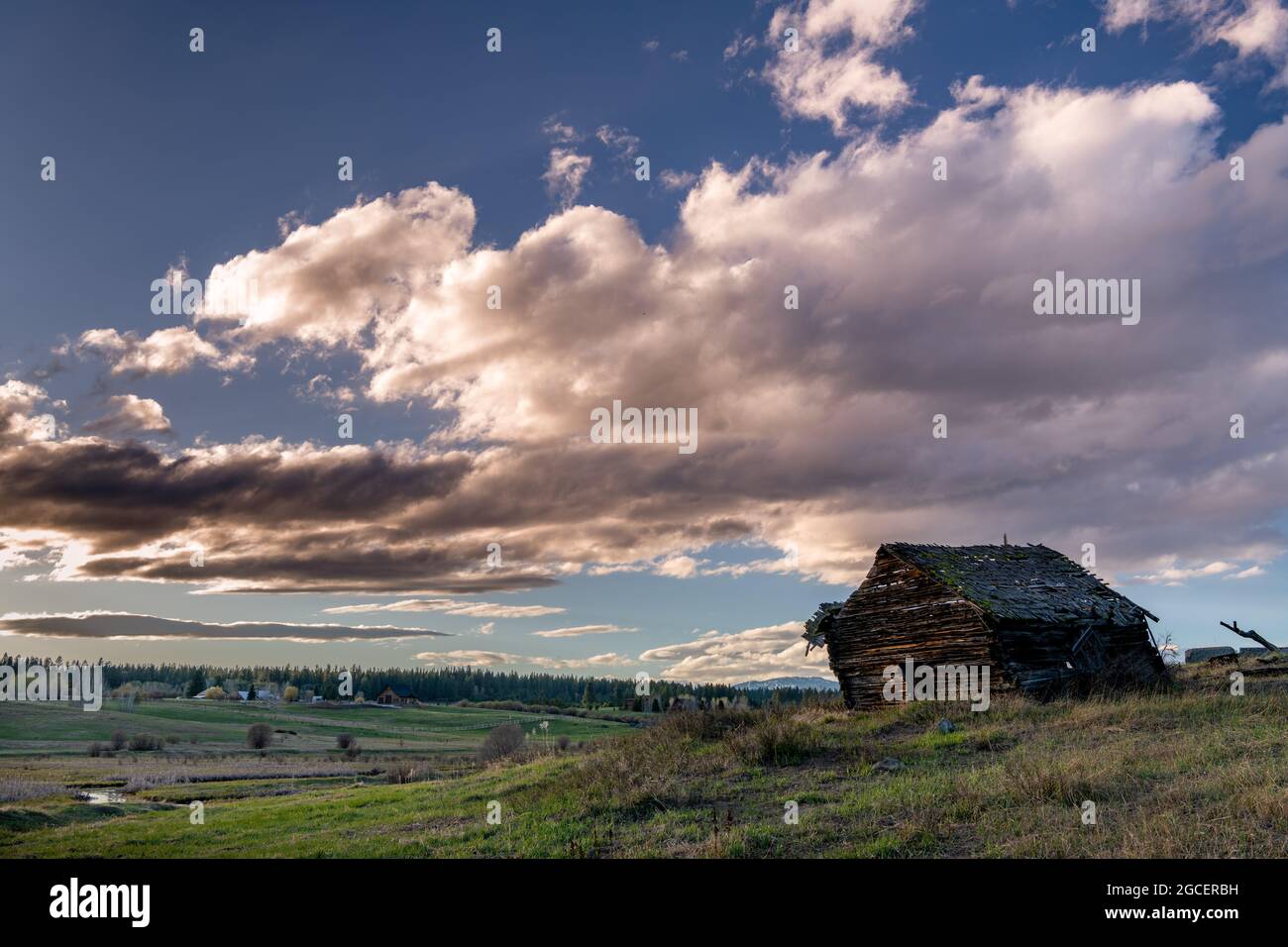 Beautiful landscape with historic log building Stock Photo - Alamy