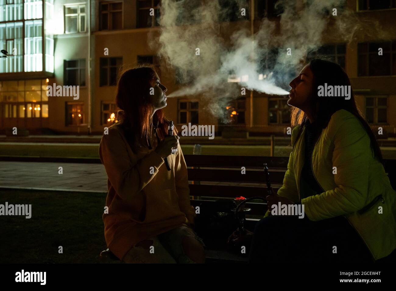 Two friends walking night hi-res stock photography and images - Alamy