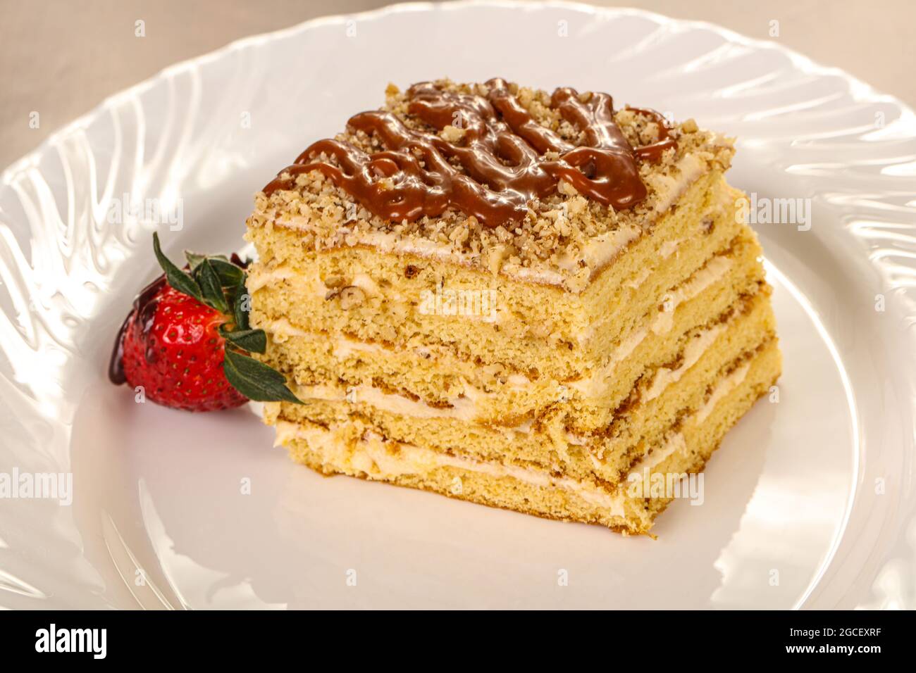 Sweet layered cake served strawberry and chocolate Stock Photo - Alamy