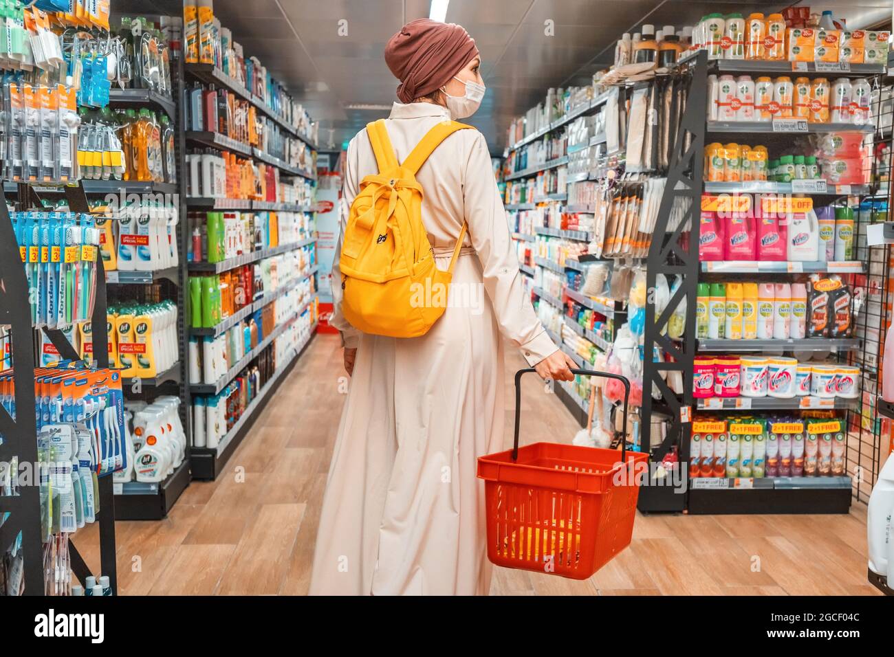 23 February 2021, Dubai, UAE: woman in a Muslim headscarf and a medical ...
