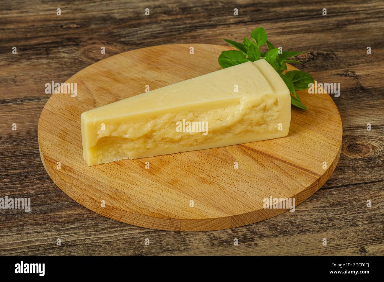 Hard parmesan cheese served basil leaves Stock Photo - Alamy