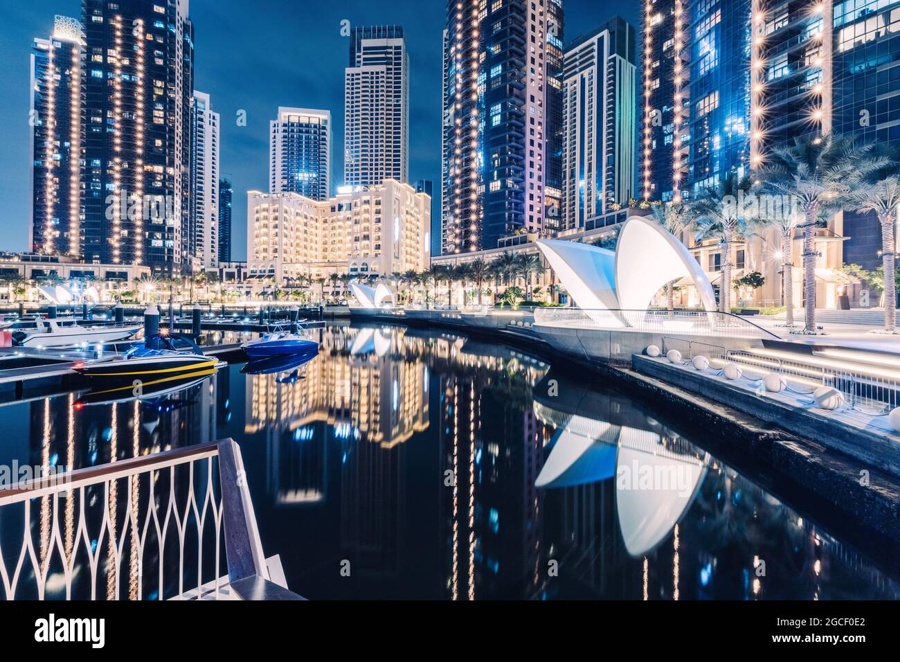 White shell arch and hotel and residential buildings in the new Dubai ...