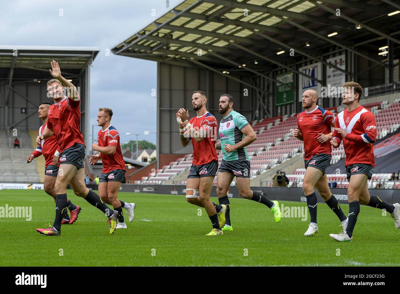 The Hull KR players begin their warm up Stock Photo - Alamy