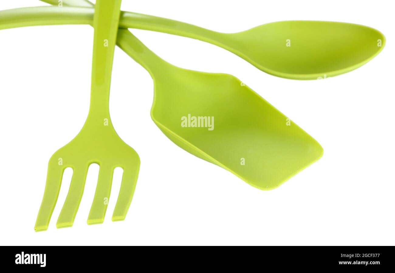 Plastic kitchen utensils isolated on white Stock Photo - Alamy