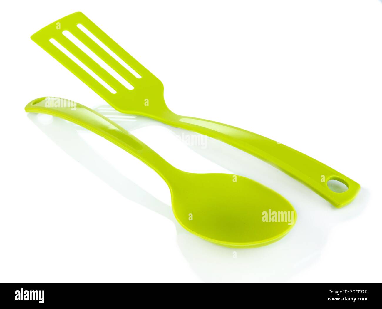Plastic kitchen utensils isolated on white Stock Photo - Alamy