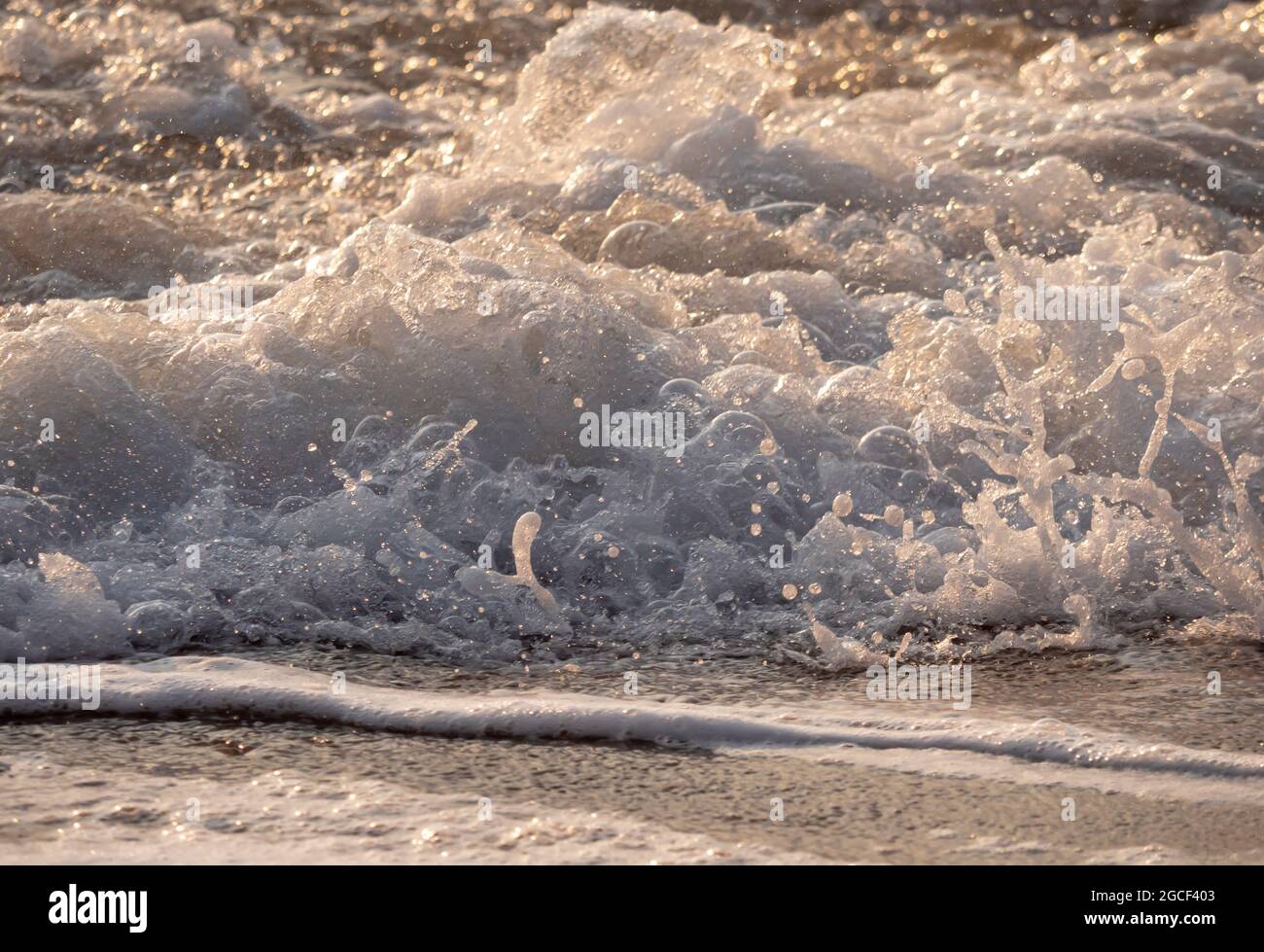 wave splash sea beach macro, close up Stock Photo - Alamy