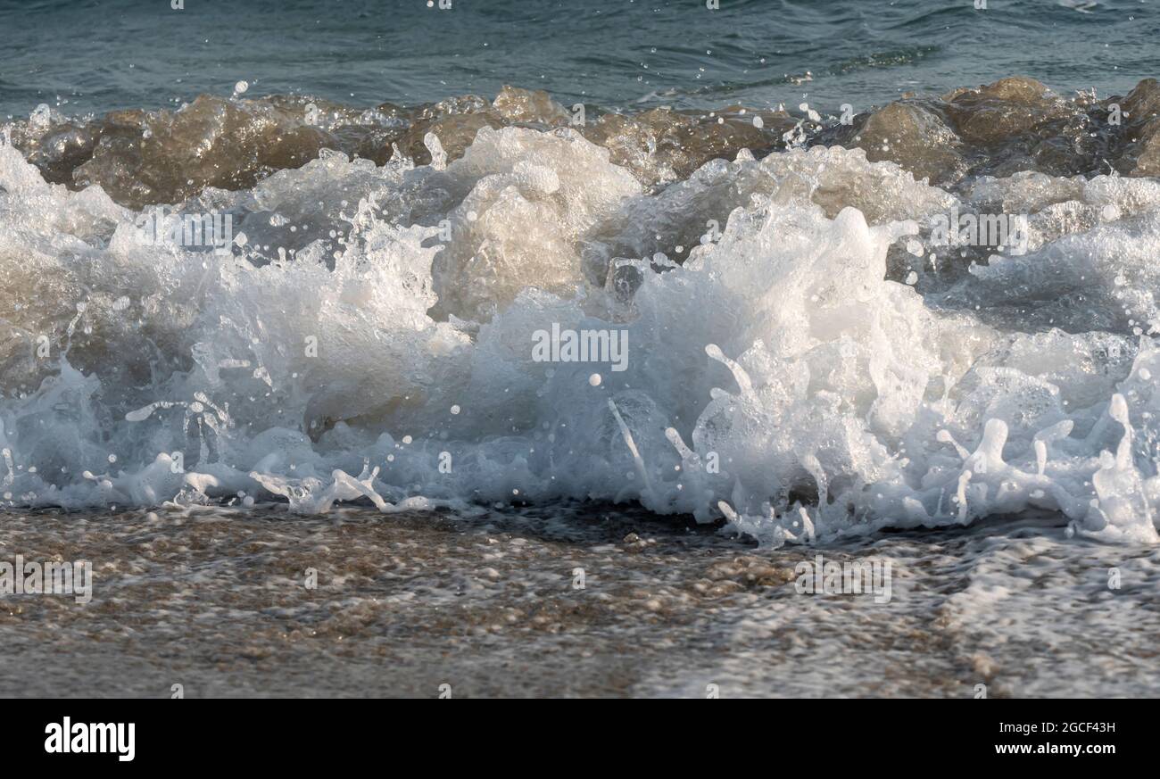 wave splash sea beach macro, close up Stock Photo - Alamy
