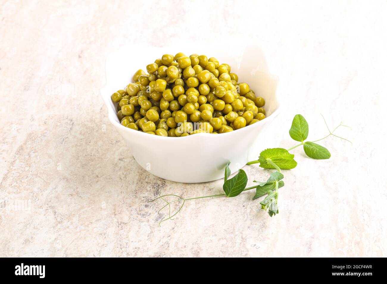 Marinated Young Green peas in the bowl Stock Photo - Alamy