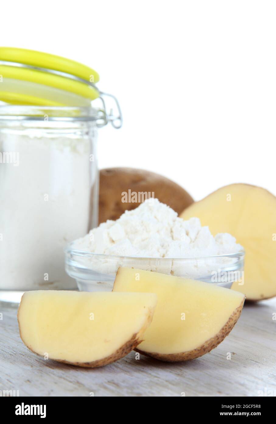 Starch in bowl and bank isolated on white Stock Photo - Alamy