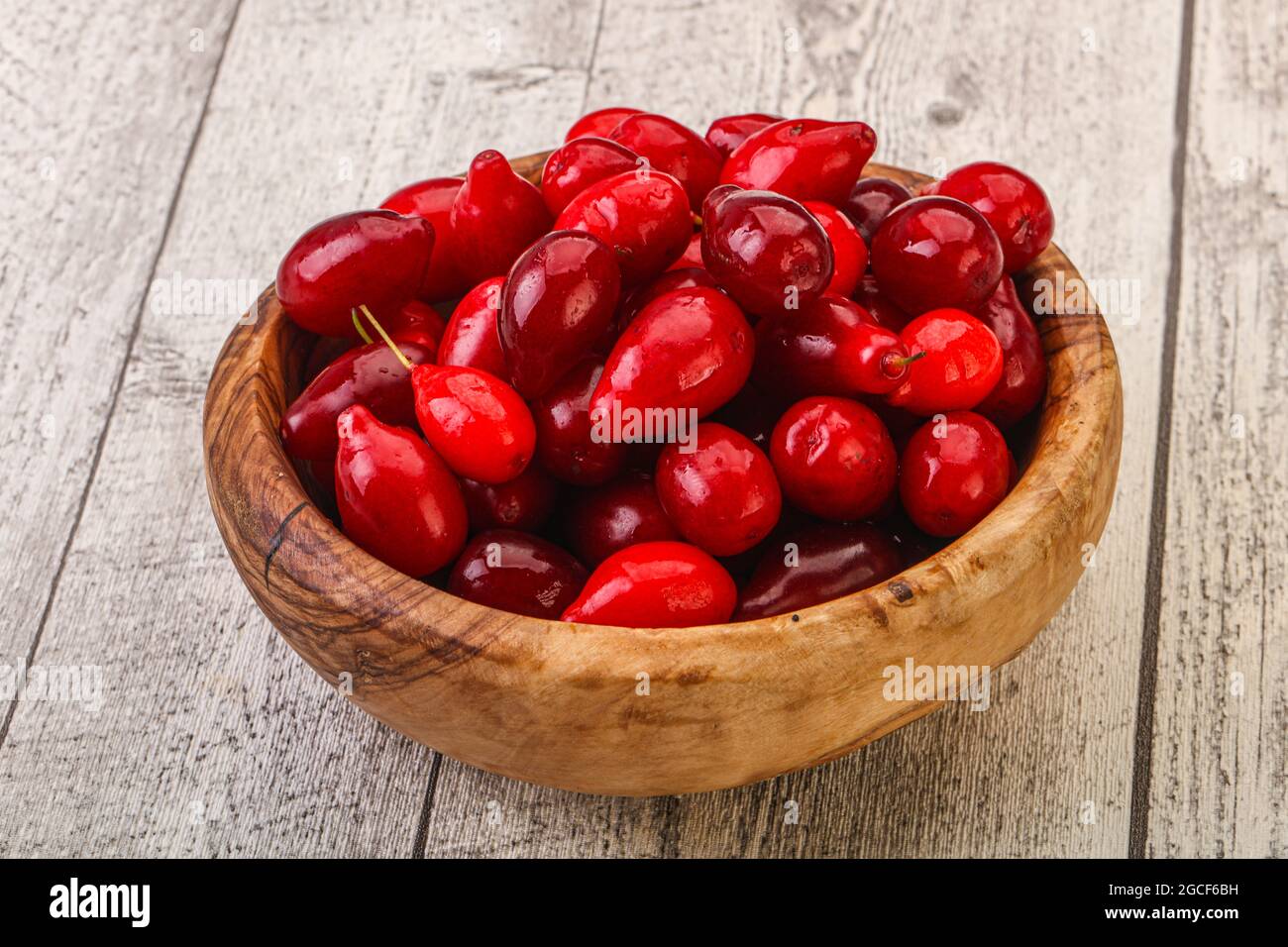 Sweet and ripe cornel or dogtree berries Stock Photo - Alamy
