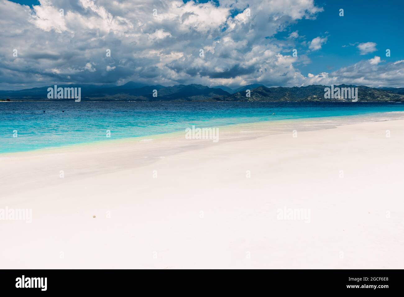 Tropical beach and blue ocean in tropics Stock Photo - Alamy