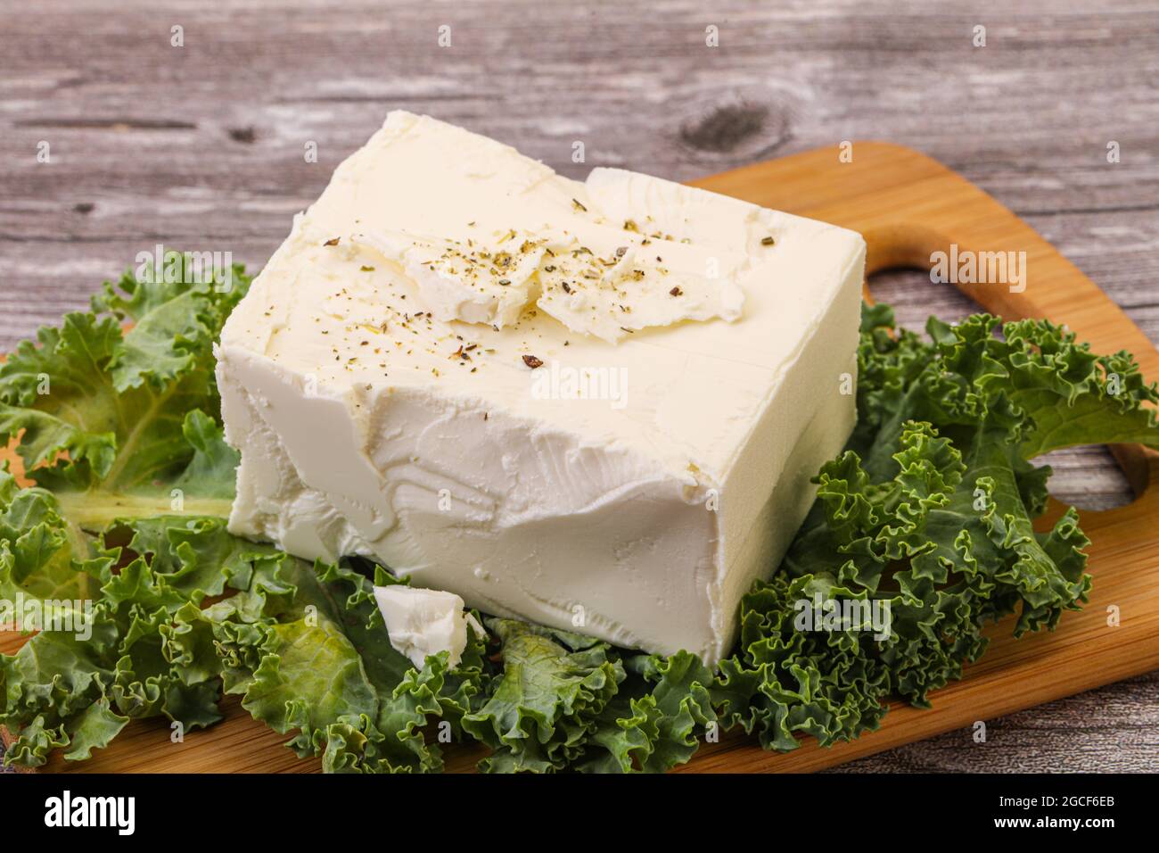 Traditional tasty Greek Feta soft cheese brick Stock Photo - Alamy